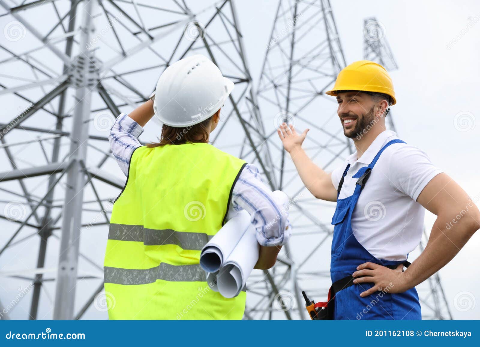 Professional Engineers Working on Installation of Electrical Substation ...