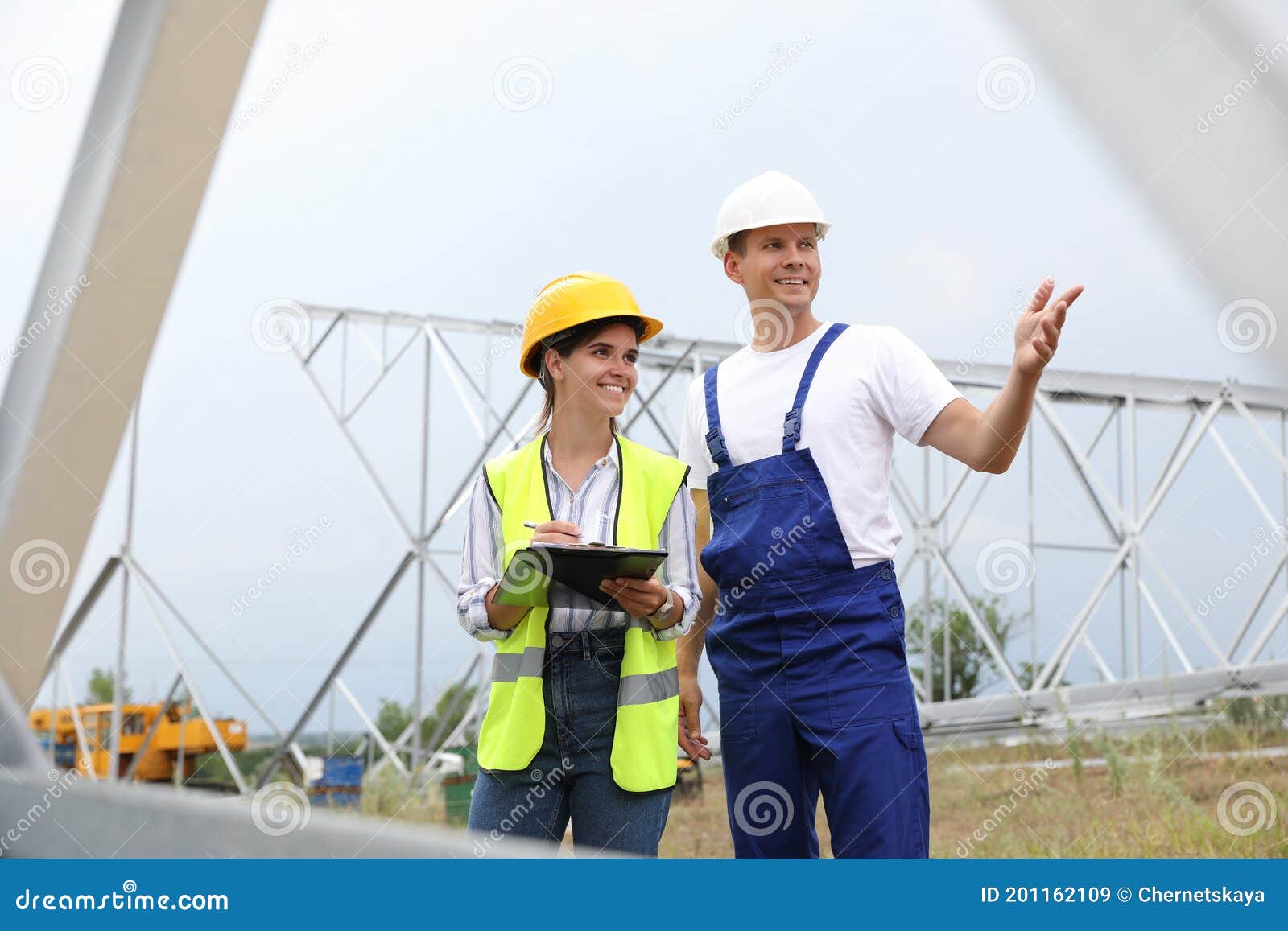 Professional Engineers Working on Installation of Electrical Substation ...