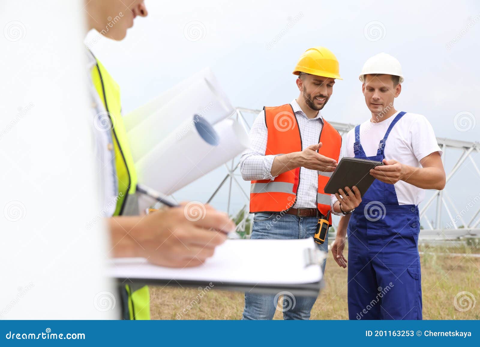 Professional Engineers Working on Installation of Electrical Substation ...