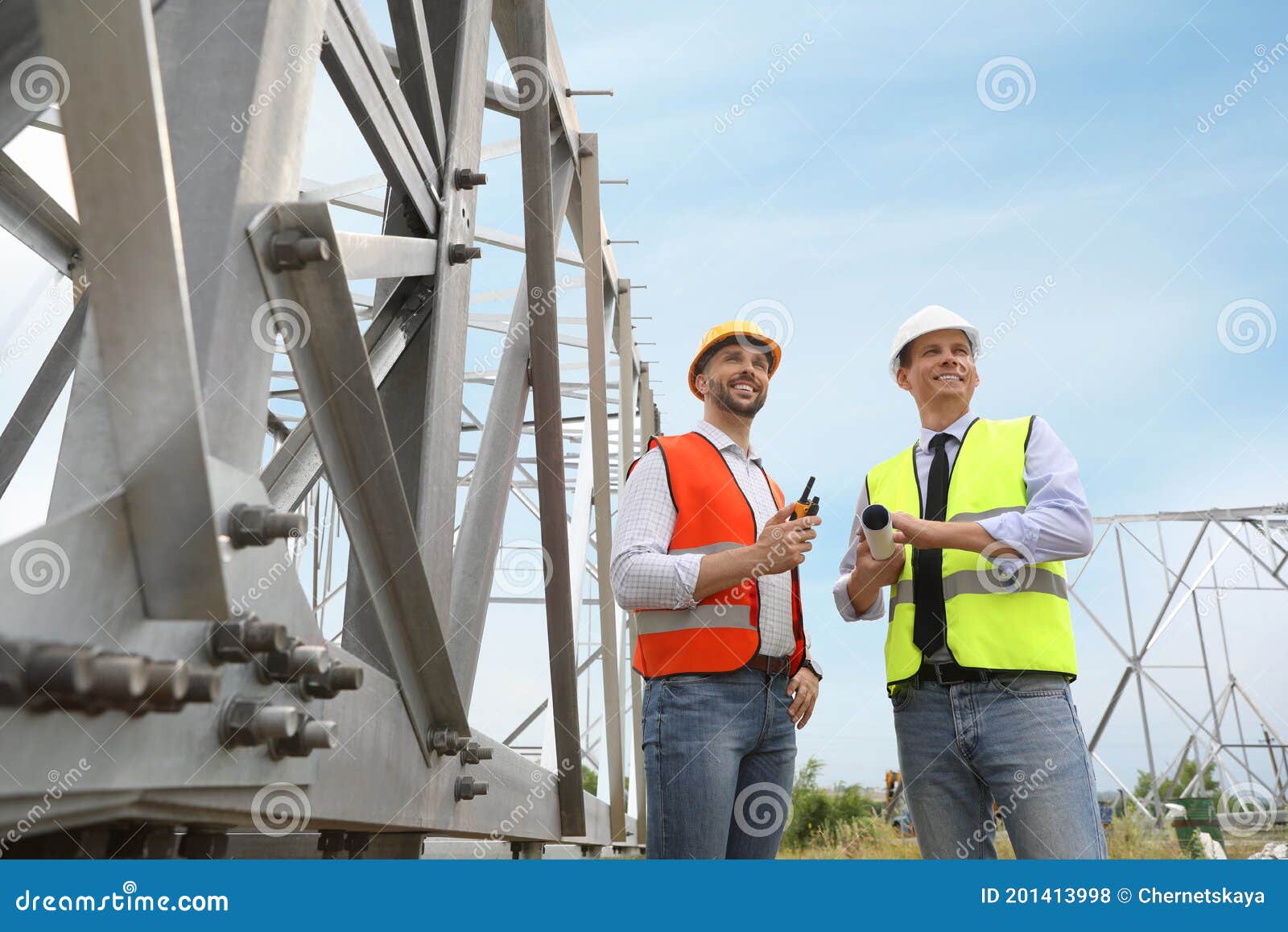Professional Engineers Working on Installation of Electrical Substation ...