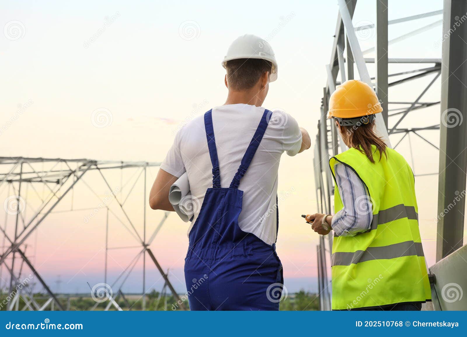 Professional Engineers Working on Installation of Electrical Substation ...