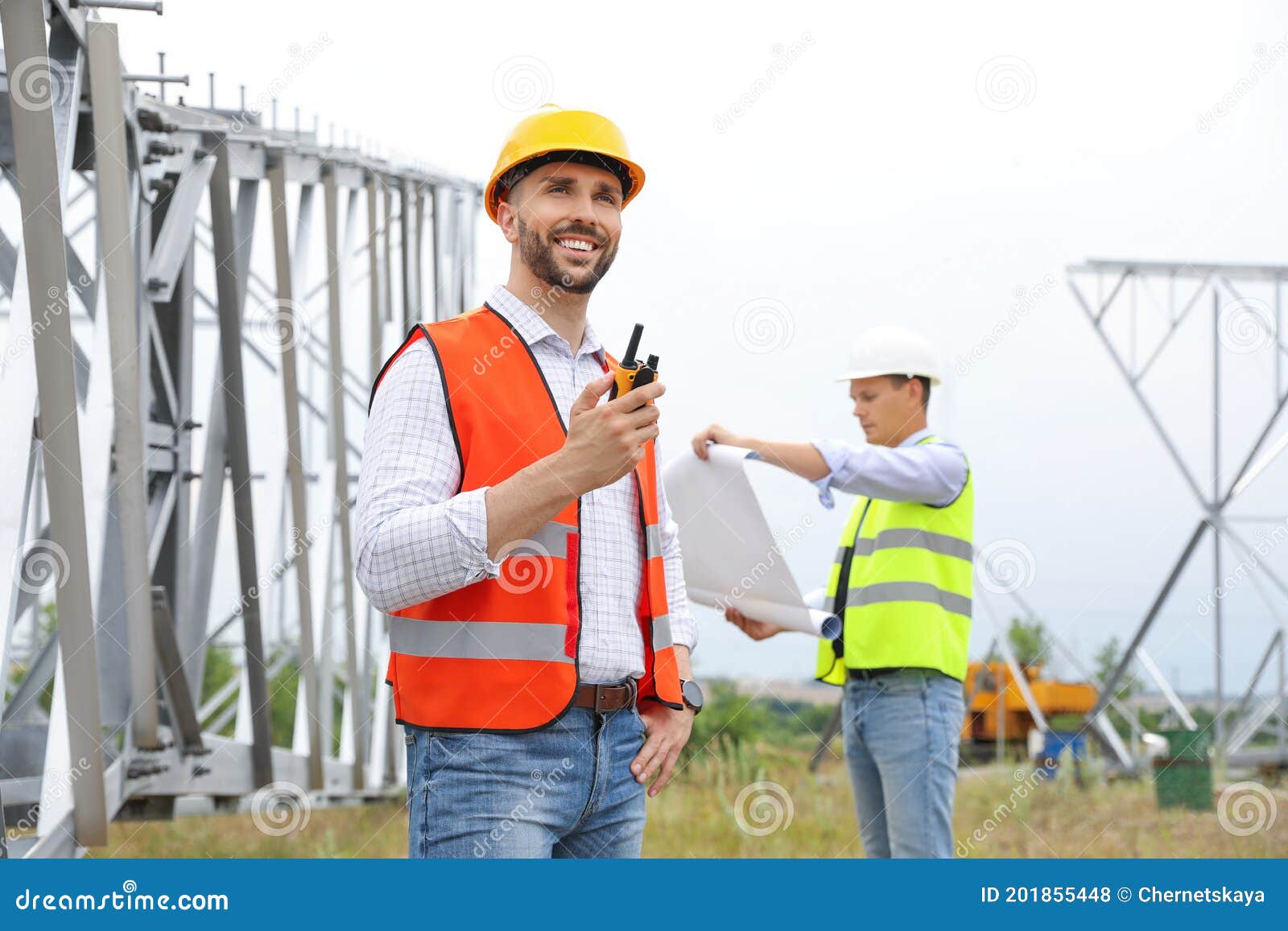 Professional Engineers Working on Installation of Electrical Substation ...