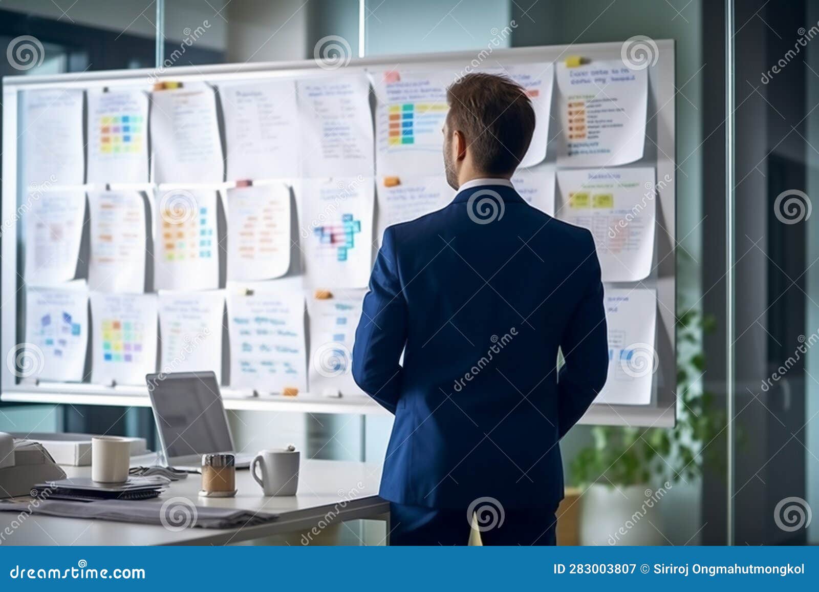 Professional Entrepreneur in Blue Suit Strategizing and Brainstorming ...