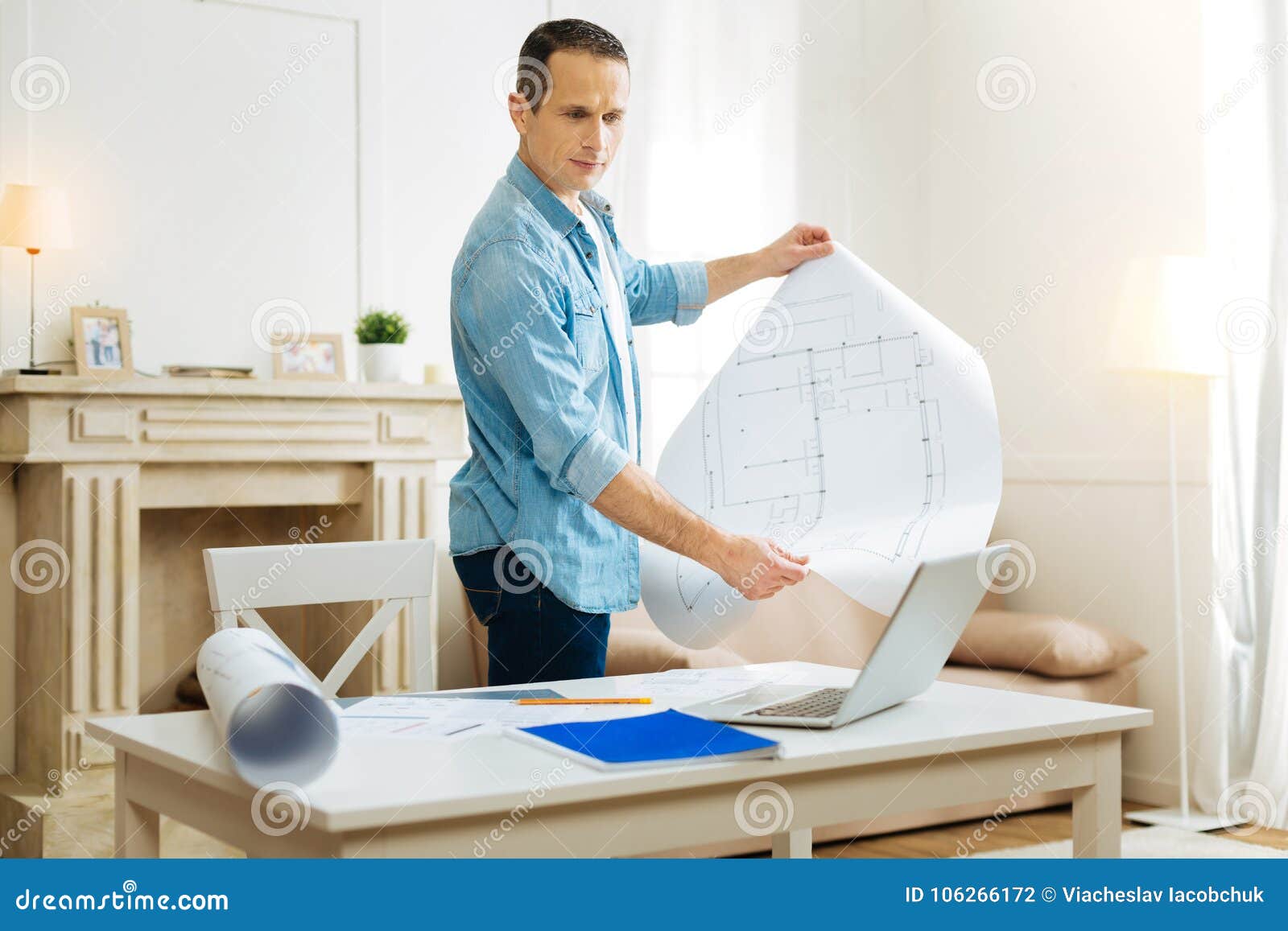 Professional Experienced Engineer Looking Serious while Working at Home ...