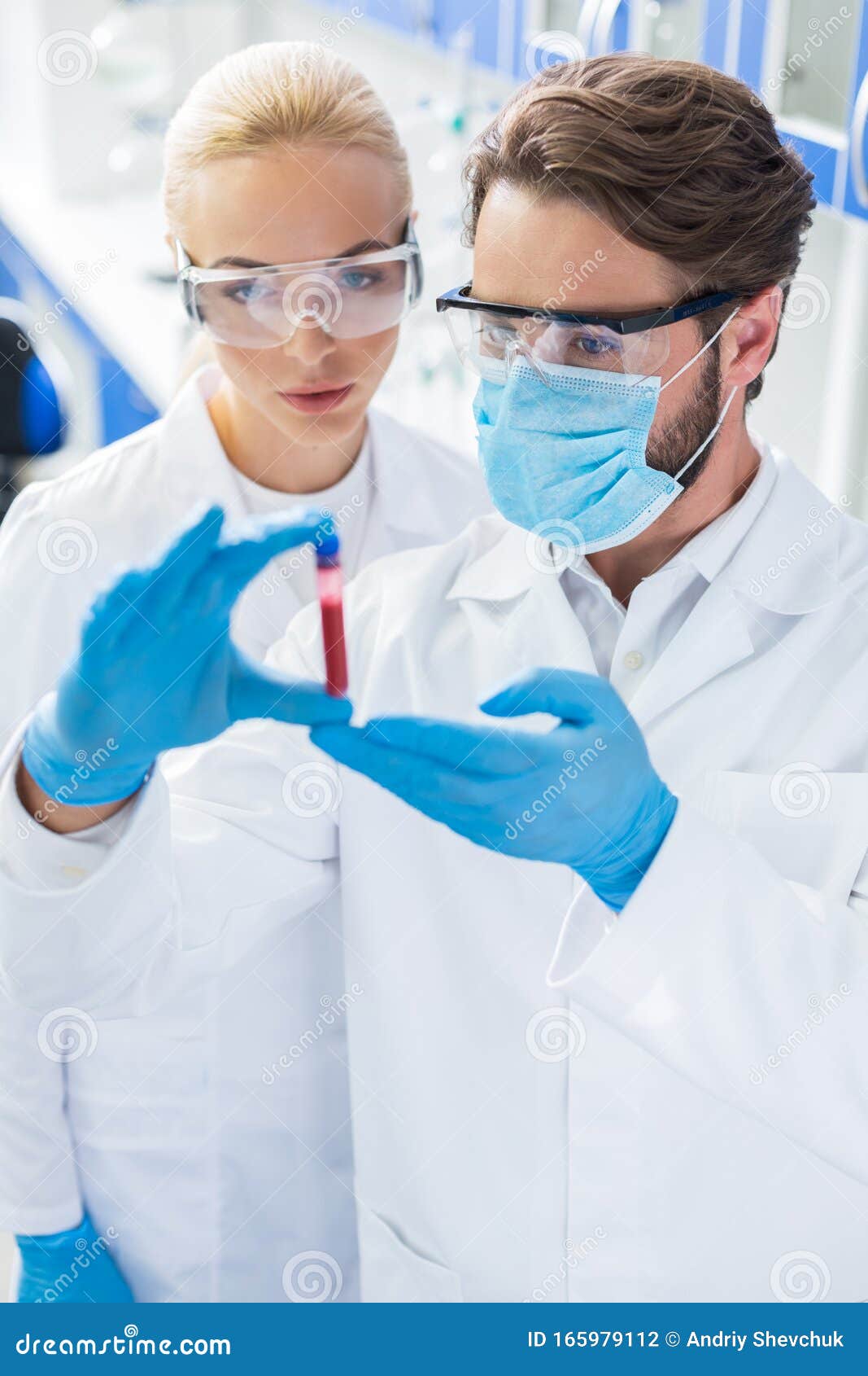 Professional Experienced Scientists Looking at the Blood Sample Stock ...