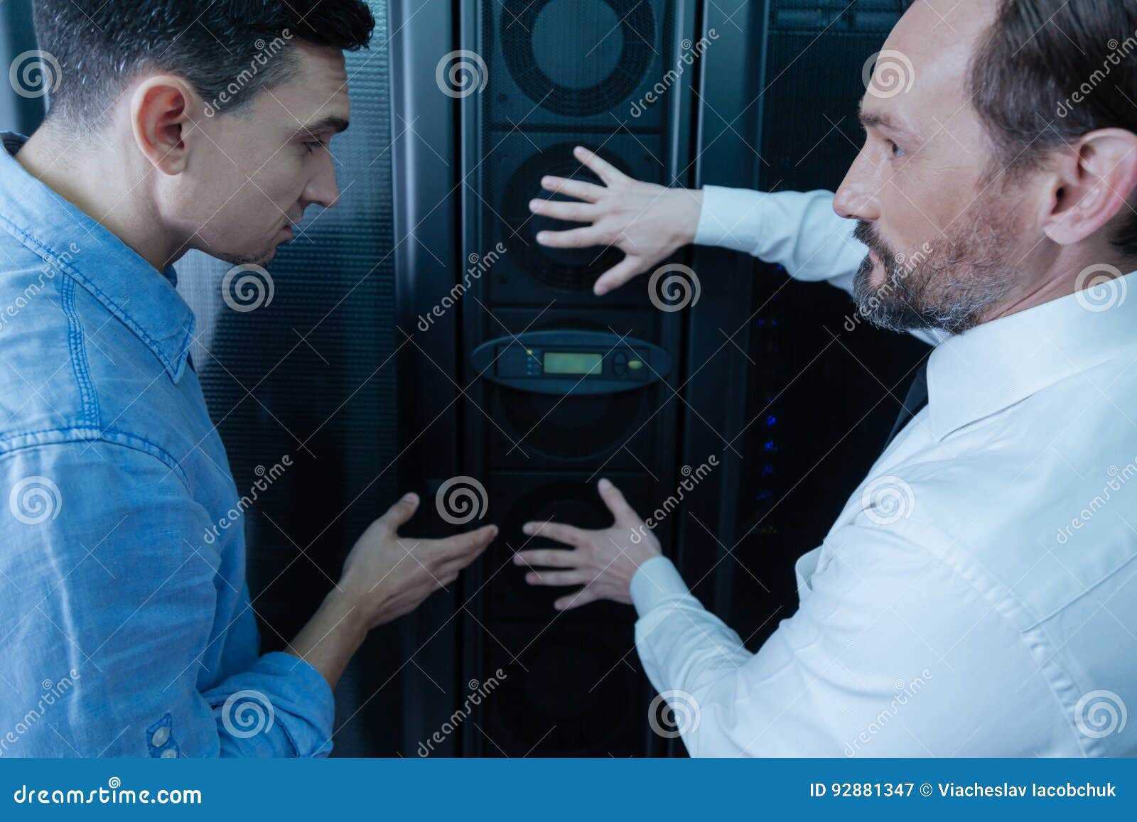 Professional Experienced Technicians Discussing Work Stock Image ...