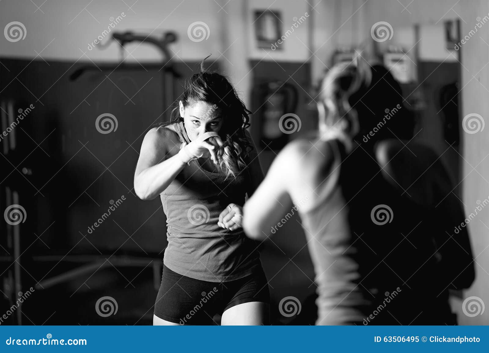 Professional Female Boxer Working Out while Looking in Mirror Stock ...