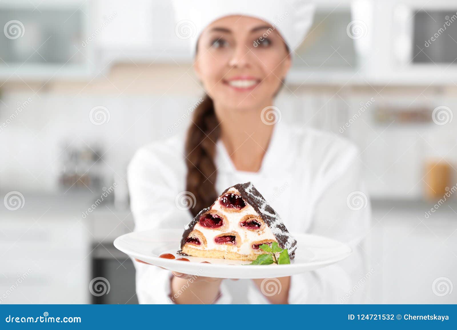 Professional Female Chef with Plate of Delicious Dessert Stock Photo ...