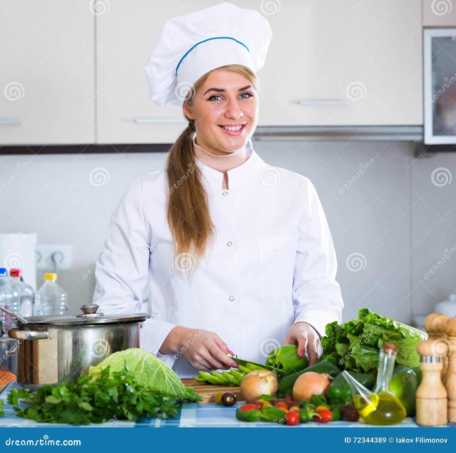 Professional Female Cook with Veggies in Kitchen Stock Image - Image of ...