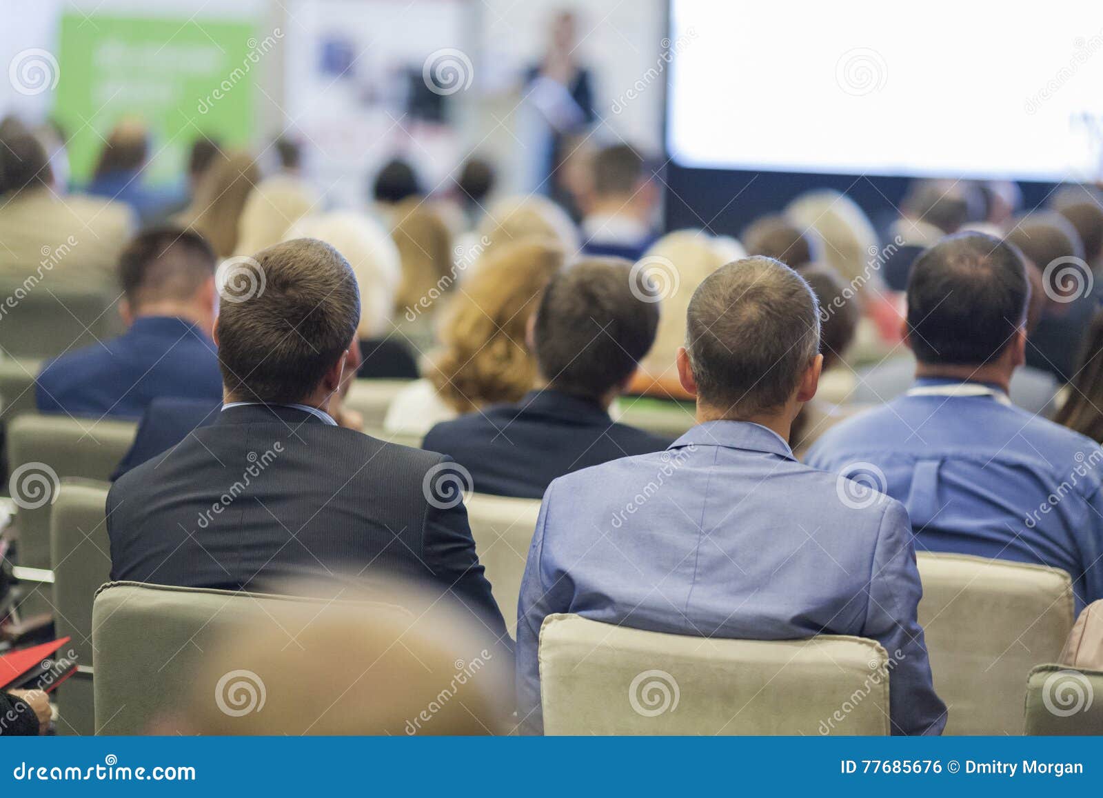 Professional Female Host Speaking in Front of the Large Audience during ...
