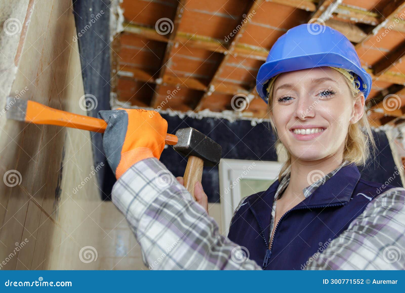 Professional Female Labourer Using Hammer and Chisel Stock Photo ...