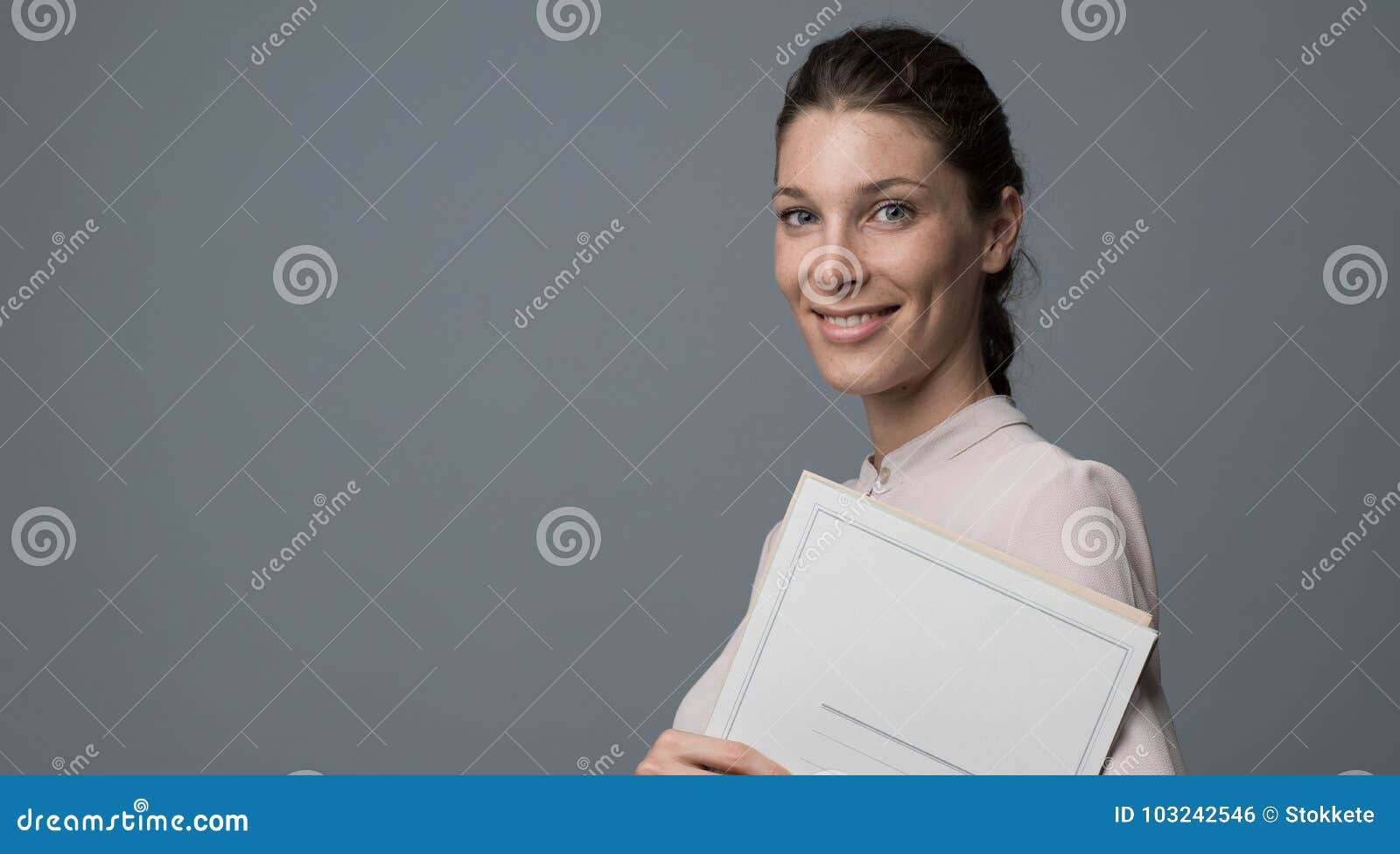 Secretary holding a folder stock photo. Image of businessperson - 103242546