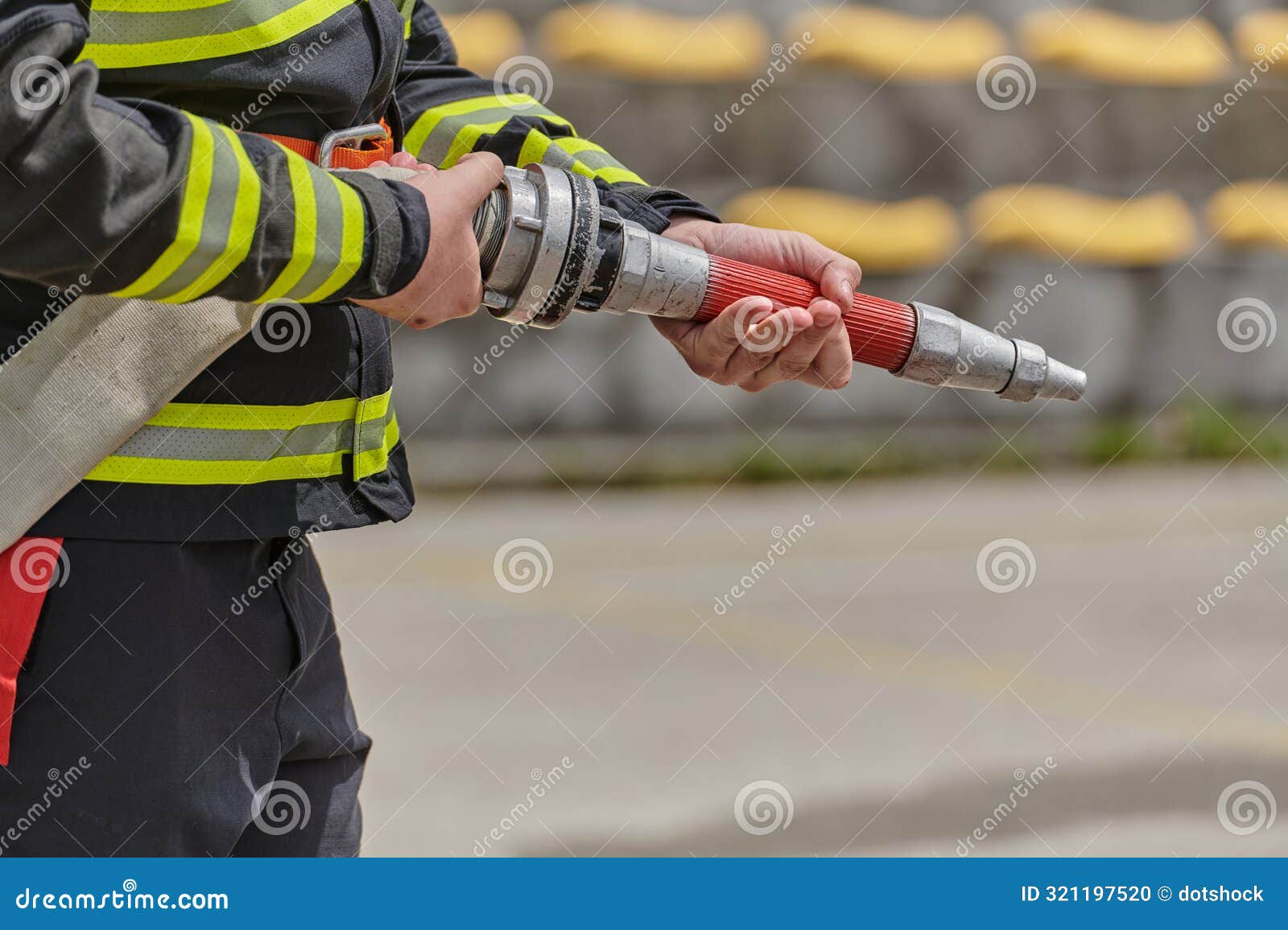 Professional Firefighter Training with Water Hose Stock Photo - Image ...