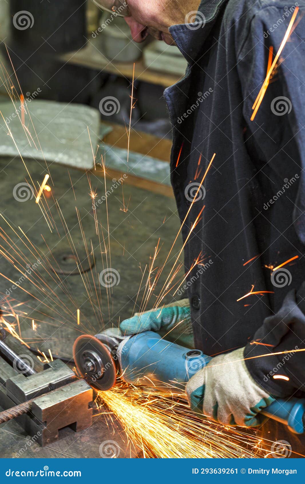 Professional Fitter in Protective Gloves and Uniform with Gringer Tool ...