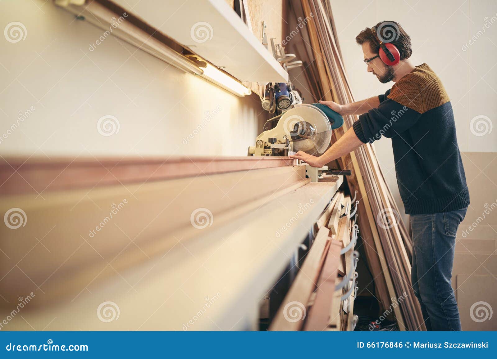 Professional Framer Using a Work Tool To Saw through Wood Stock Photo ...