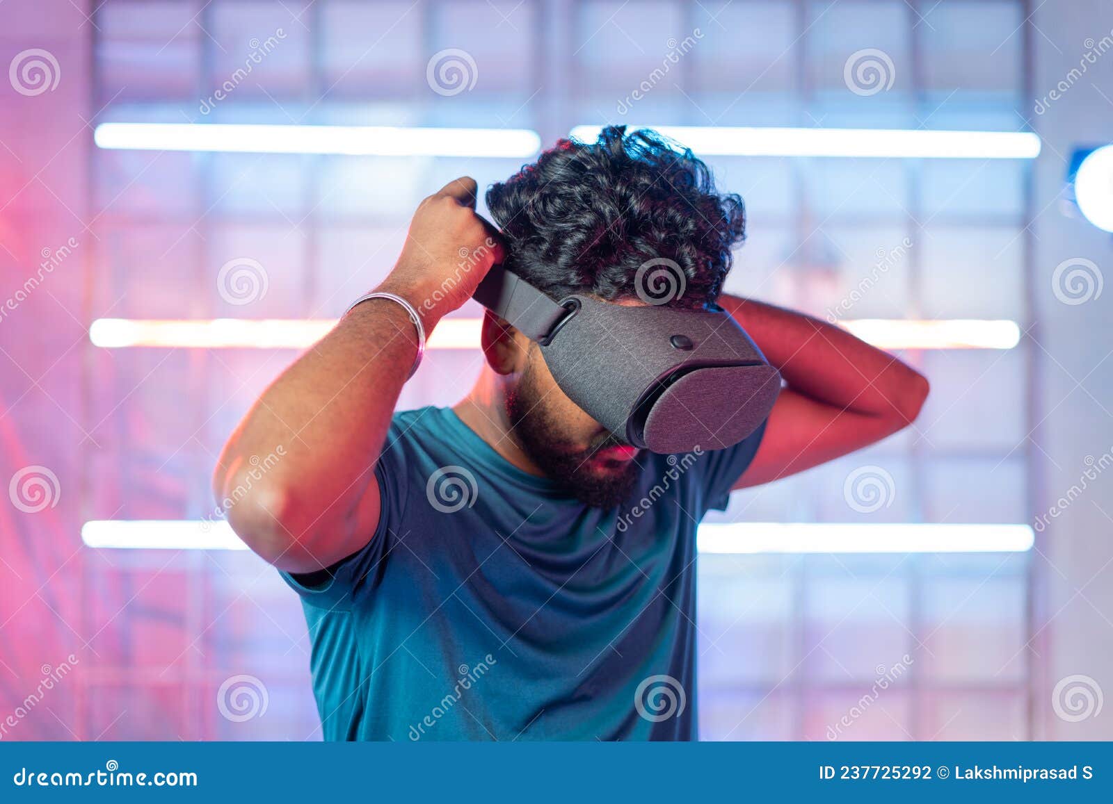 Professional Gamer Wearing VR by with Mobile Inside the Headset before ...