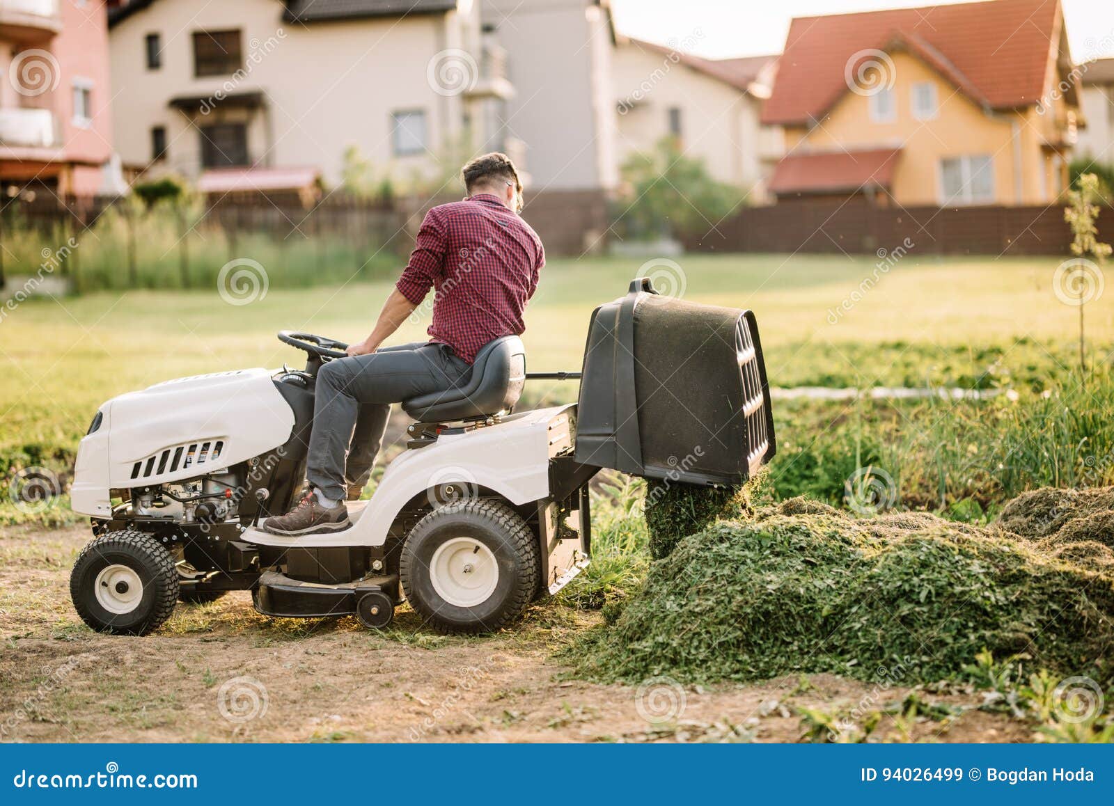 Professional Gardner Worker Using Lawn Mower For Cutting Grass In ...