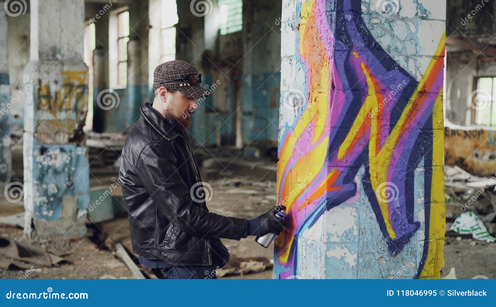 Professional Graffiti Painter is Creating Abstract Image on Large ...