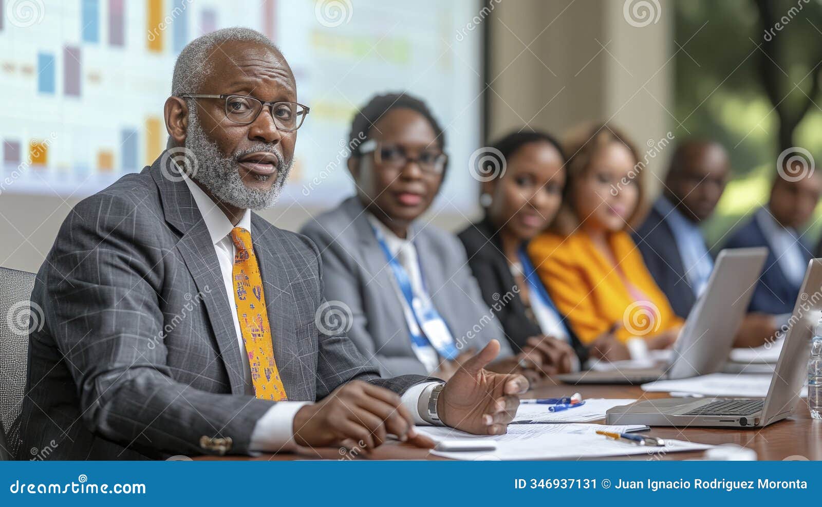 Diverse Business Team in Corporate Meeting with Senior Executive ...