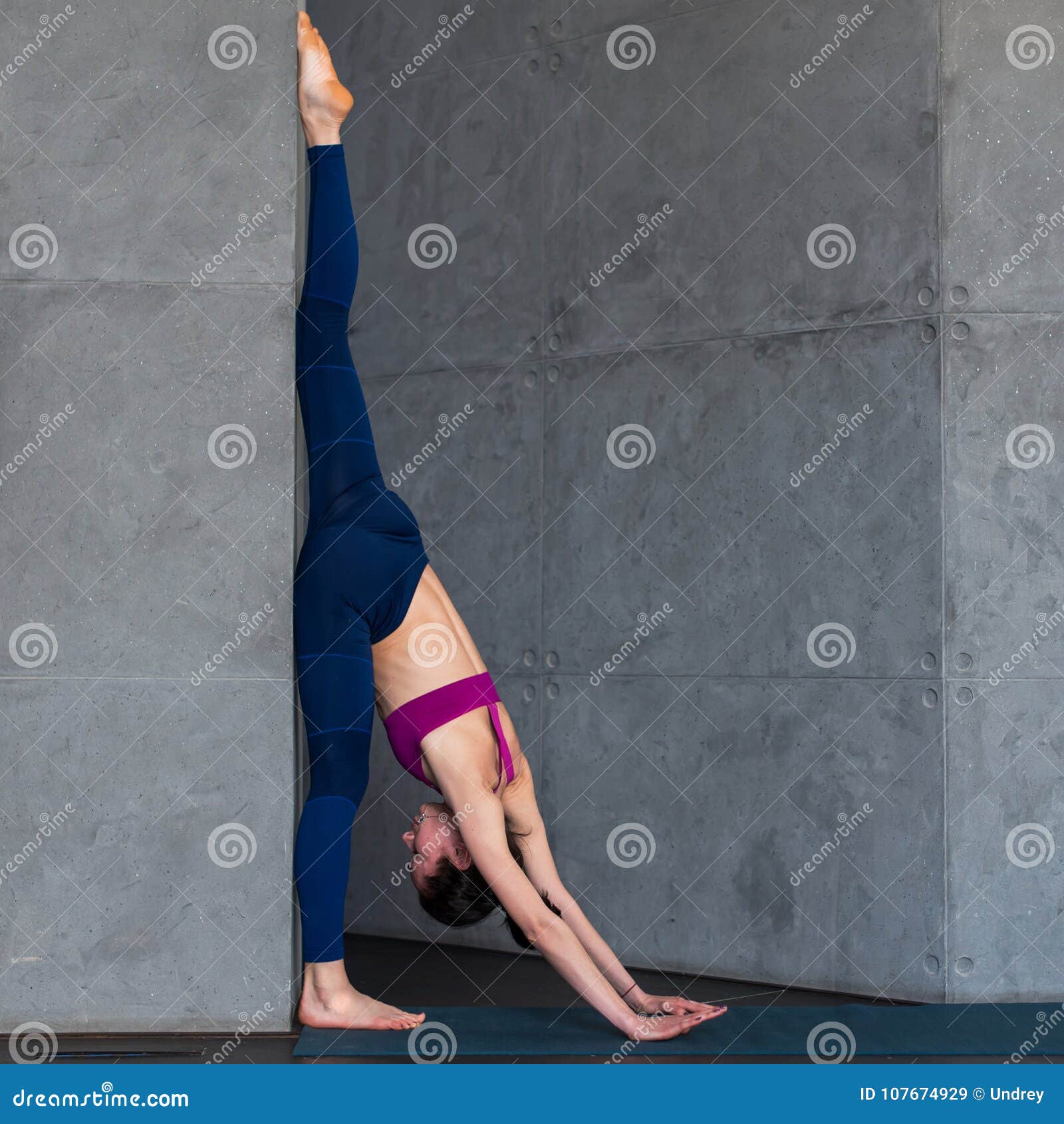Professional Gymnast Doing Warming-up Stretching Exercise Performing ...