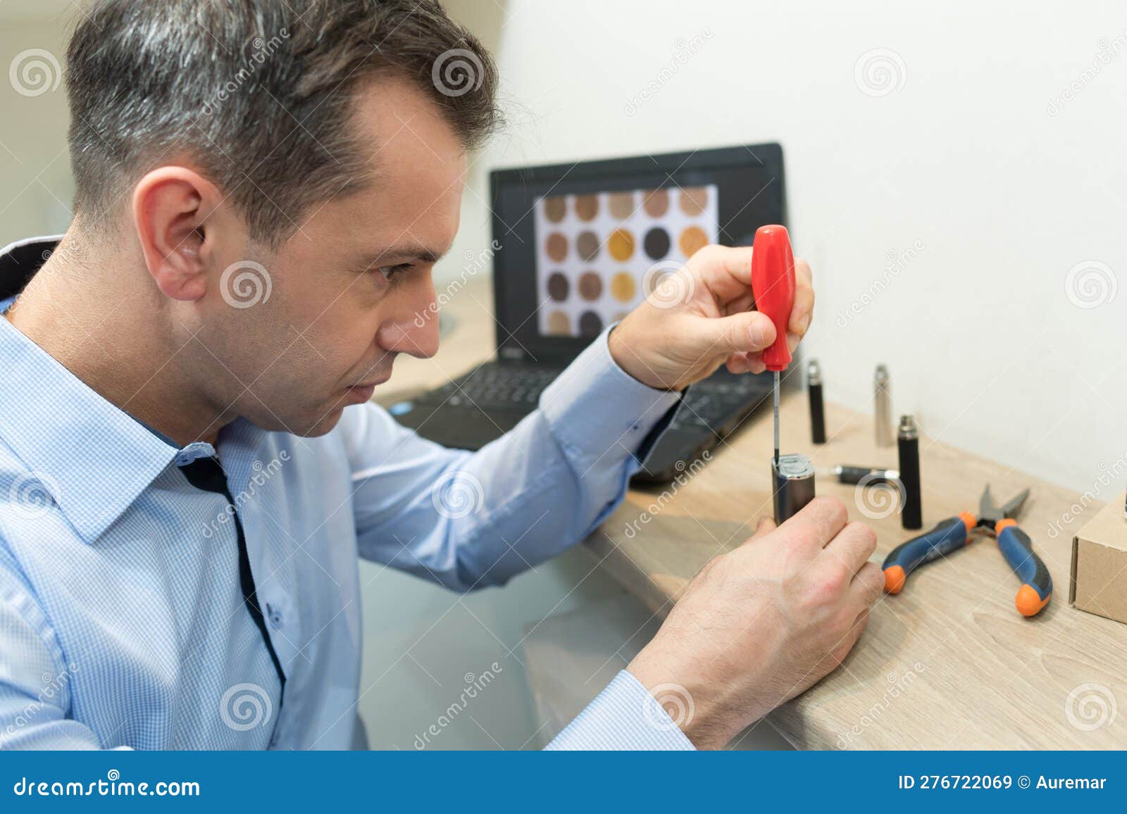 Professional Hand Repairing and Fixing Broken Electronics Device Stock ...