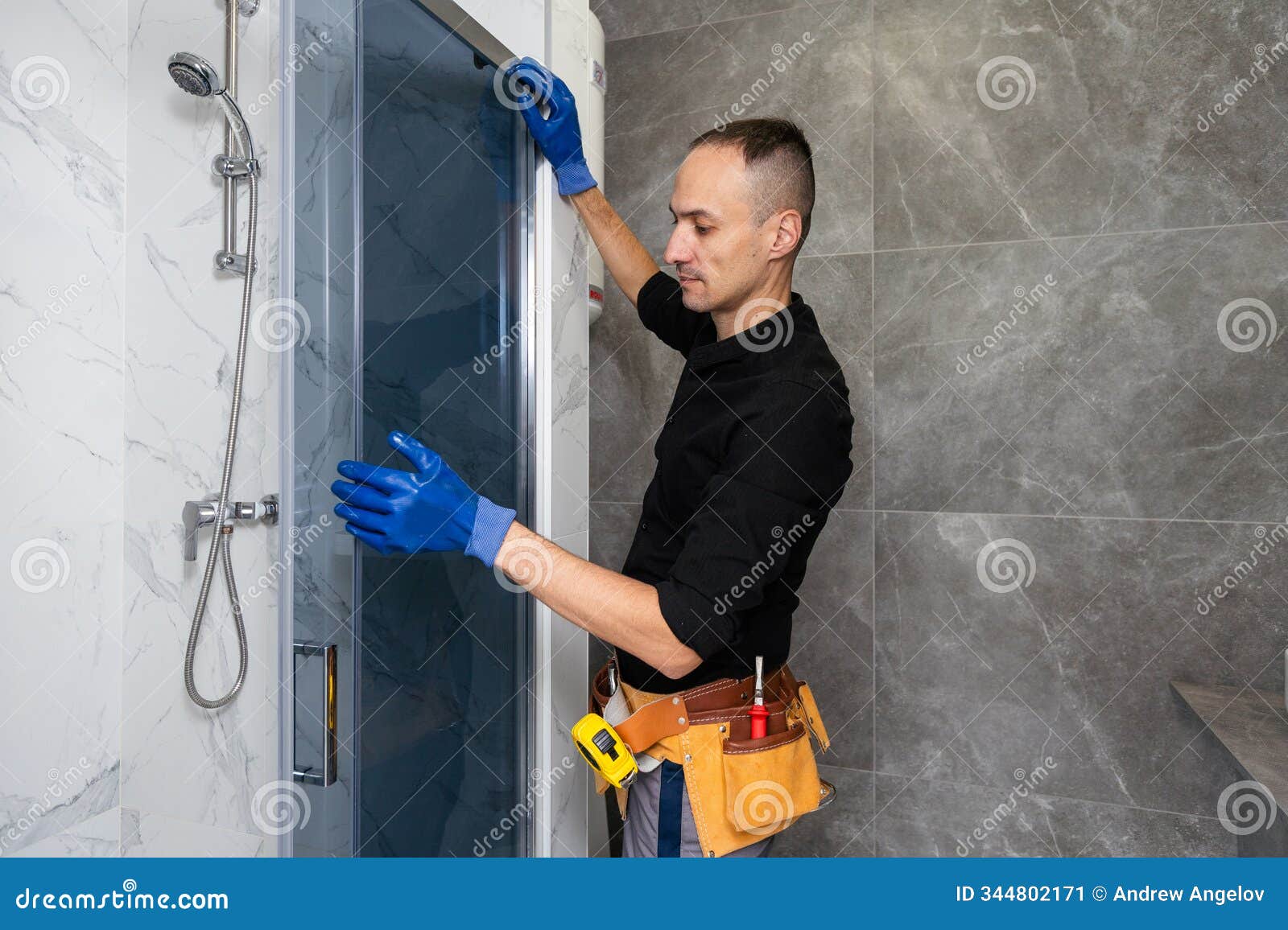 Professional Handyman Working in Shower Booth Indoors Stock Image ...
