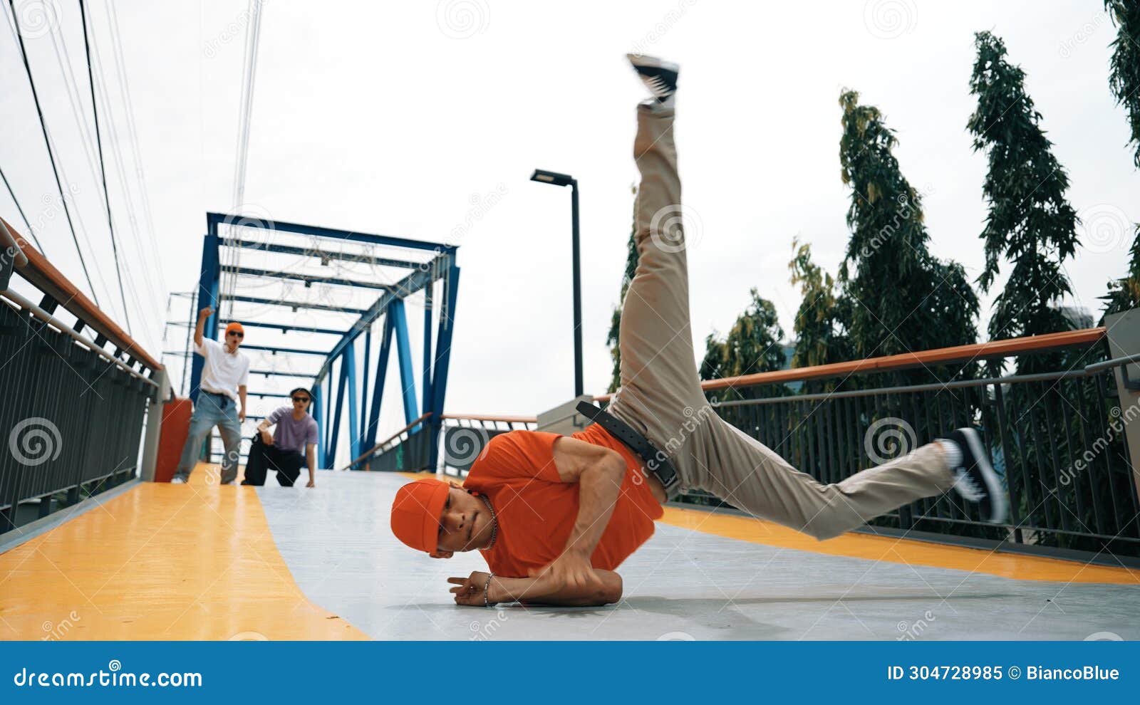 Professional Hipster Doing Head Spin while Friend Cheering Him ...