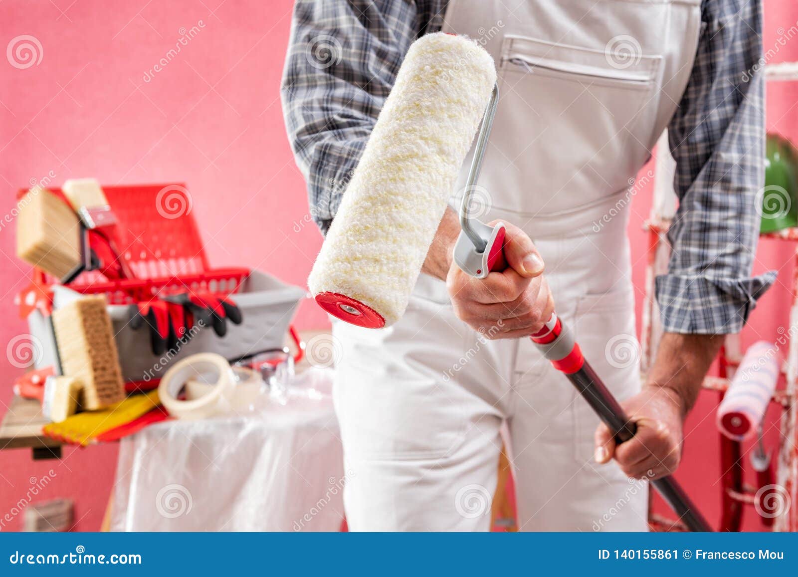 Professional House Painter at Work on the Construction Site Stock Image ...