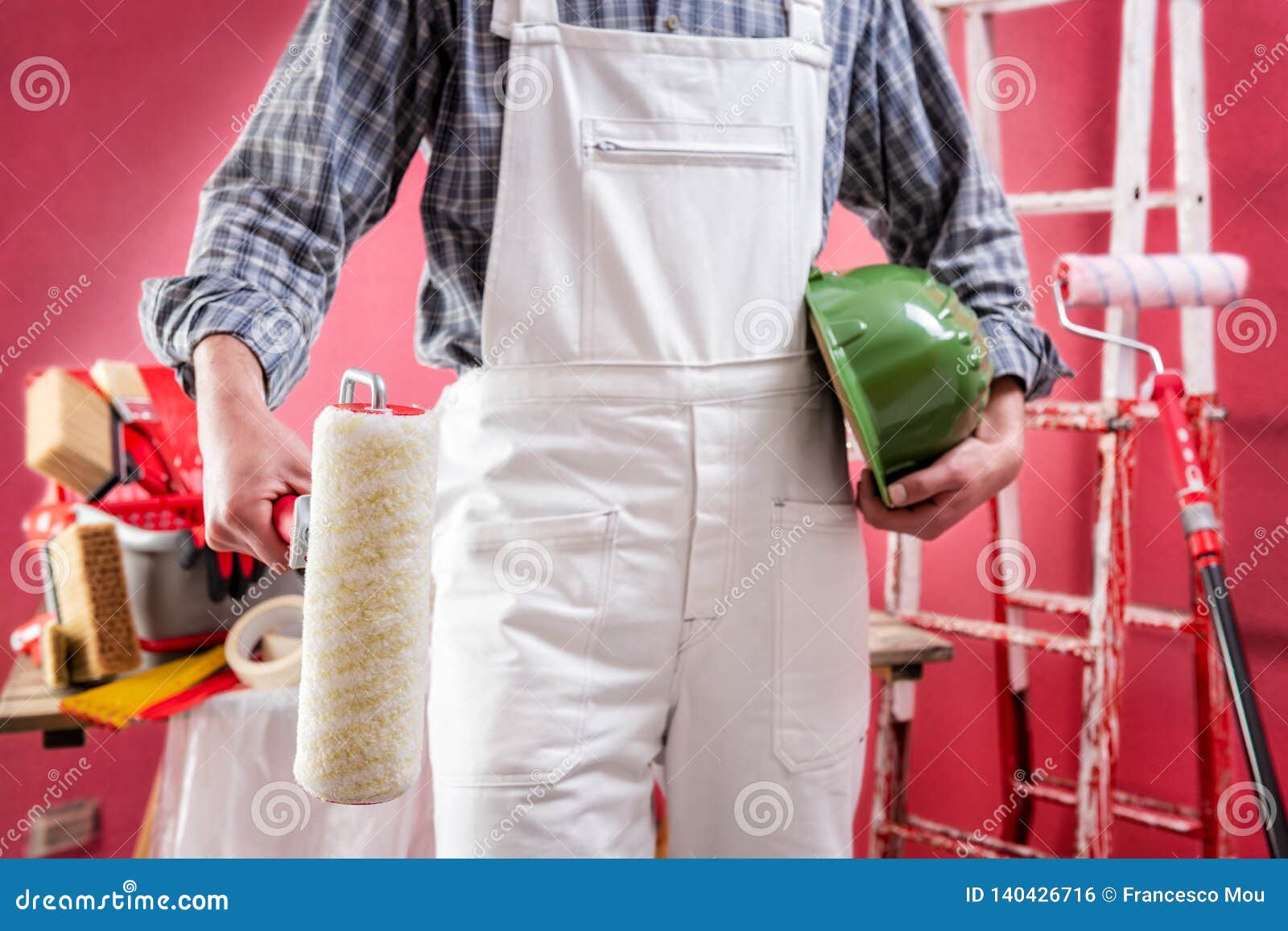 Professional House Painter at Work on the Construction Site Stock Photo ...
