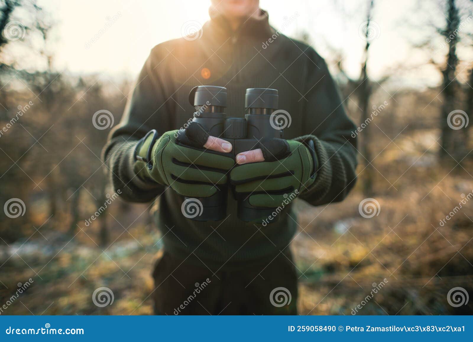 Professional Hunter Looking through Binoculars. Man on the Hunt in the ...