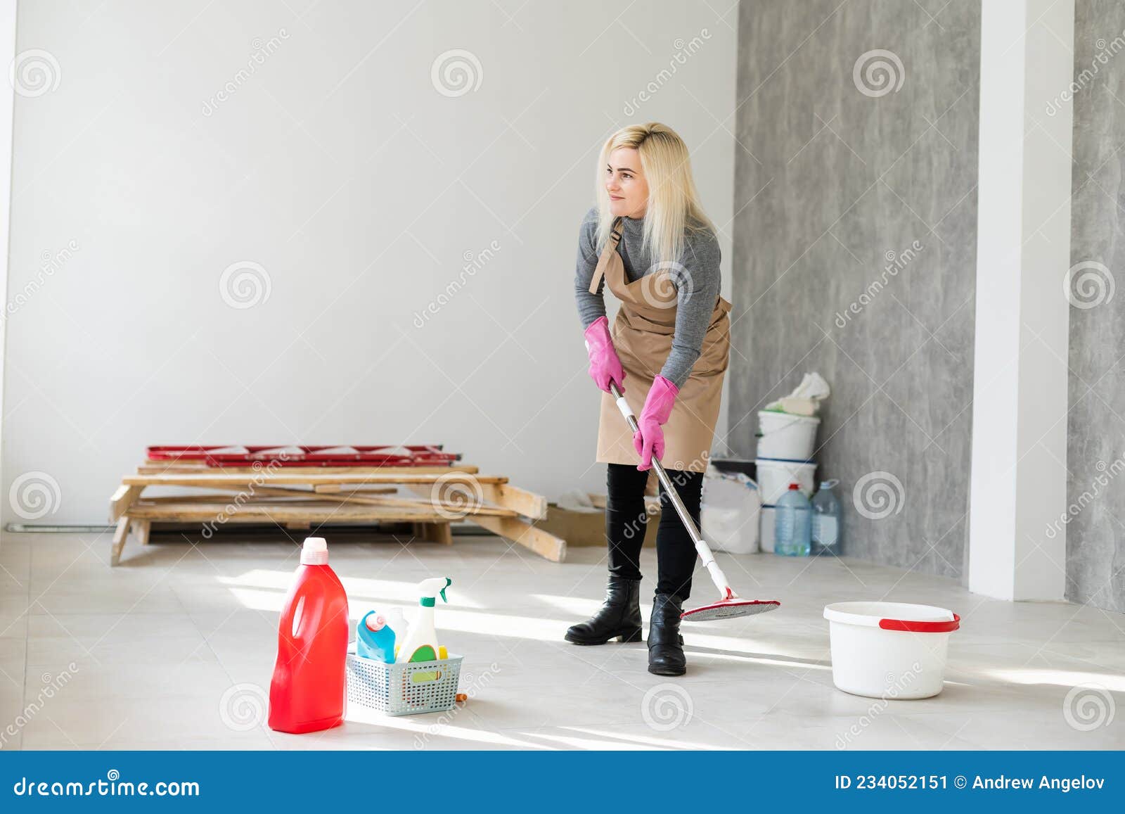Professional Janitor Cleaning Baseboard after Renovation Stock Image ...