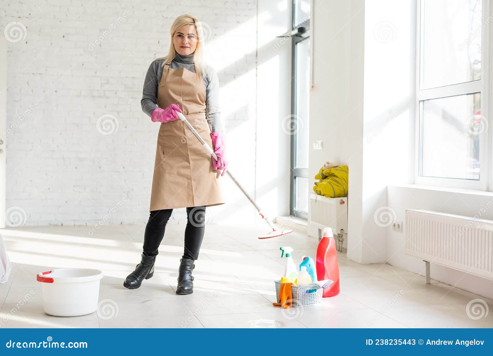Professional Janitor Cleaning Baseboard after Renovation Stock Image ...