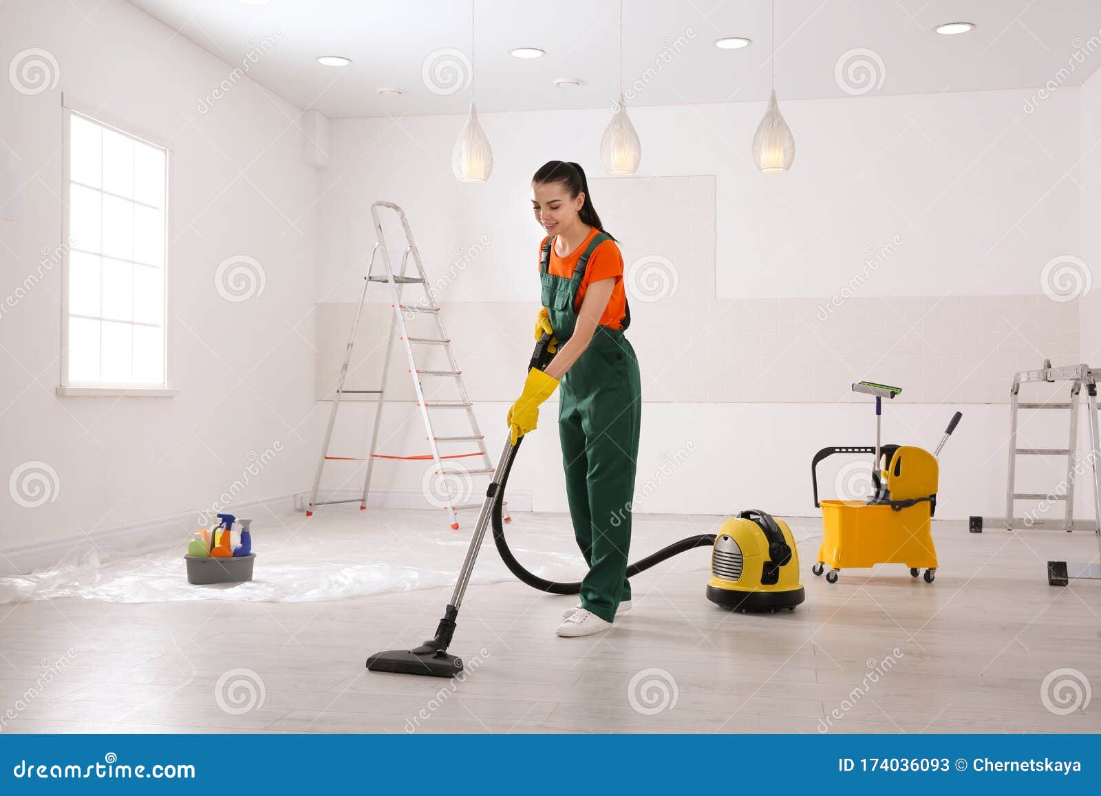 Janitor Cleaning Room with Vacuum after Renovation Stock Image - Image ...