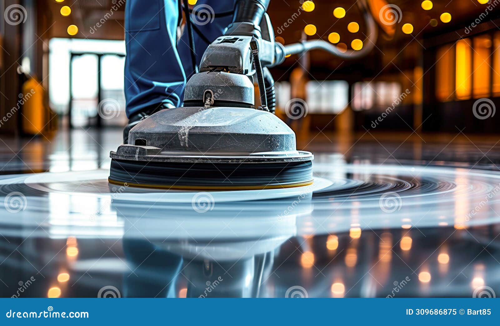 Professional Janitorial Staff Using An Industrial Floor Buffer Machine ...