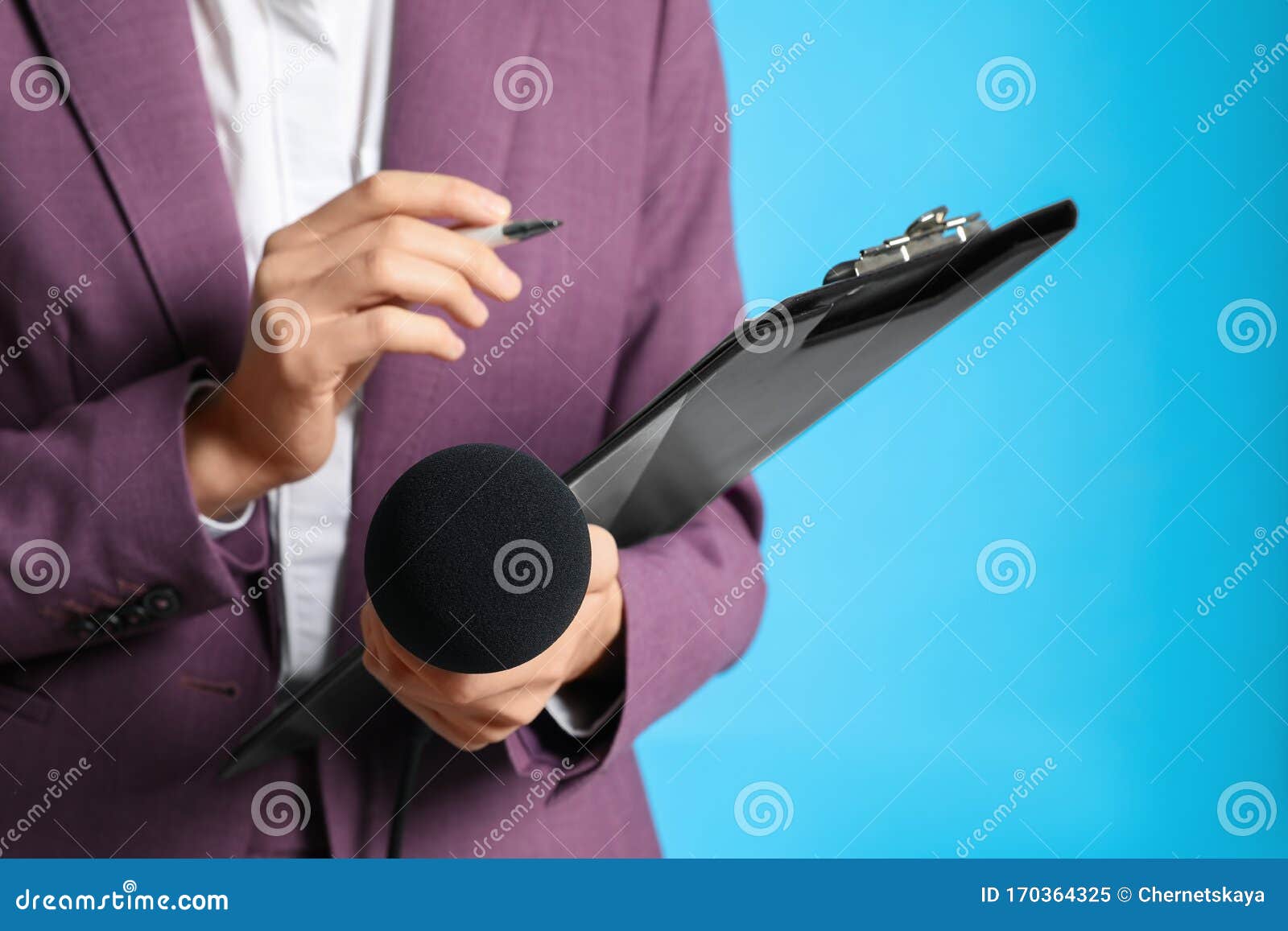 Professional Journalist Taking Notes on Light Blue Background, Closeup ...