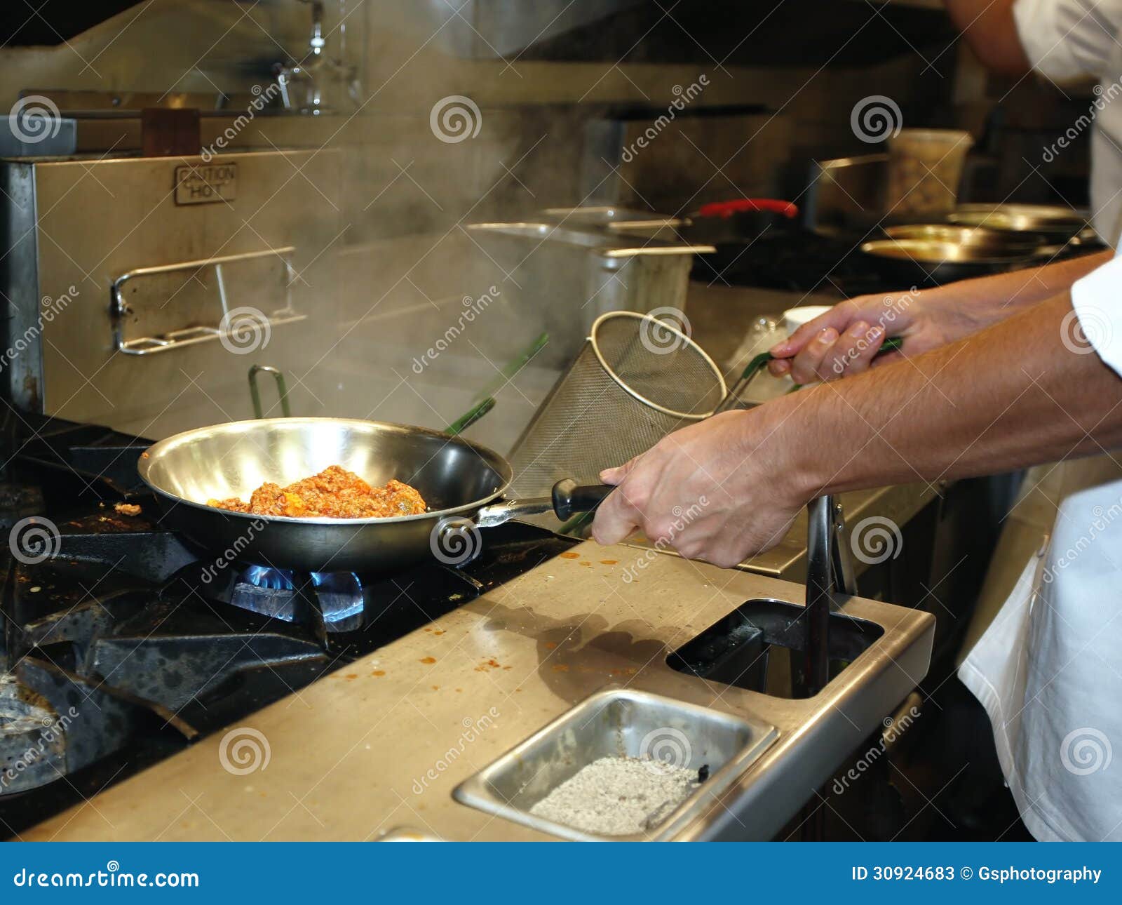 Professional Kitchen: Making Sauce Stock Image - Image of cook, fire ...