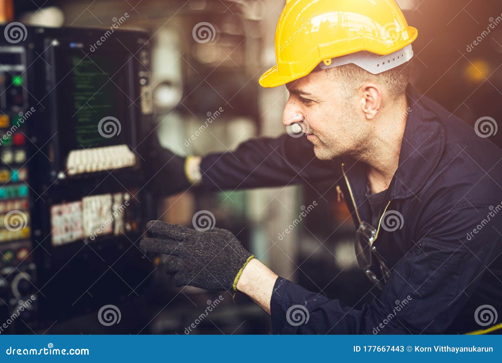Professional Labor Worker Engineer Monitor At Machine Control Panel And ...