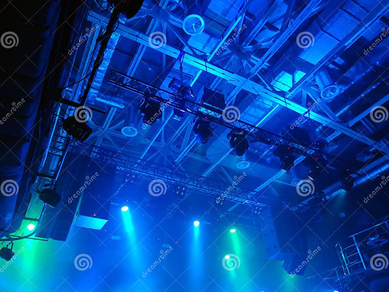 Professional Lighting Equipment on the Stage Ceiling on a Blue ...