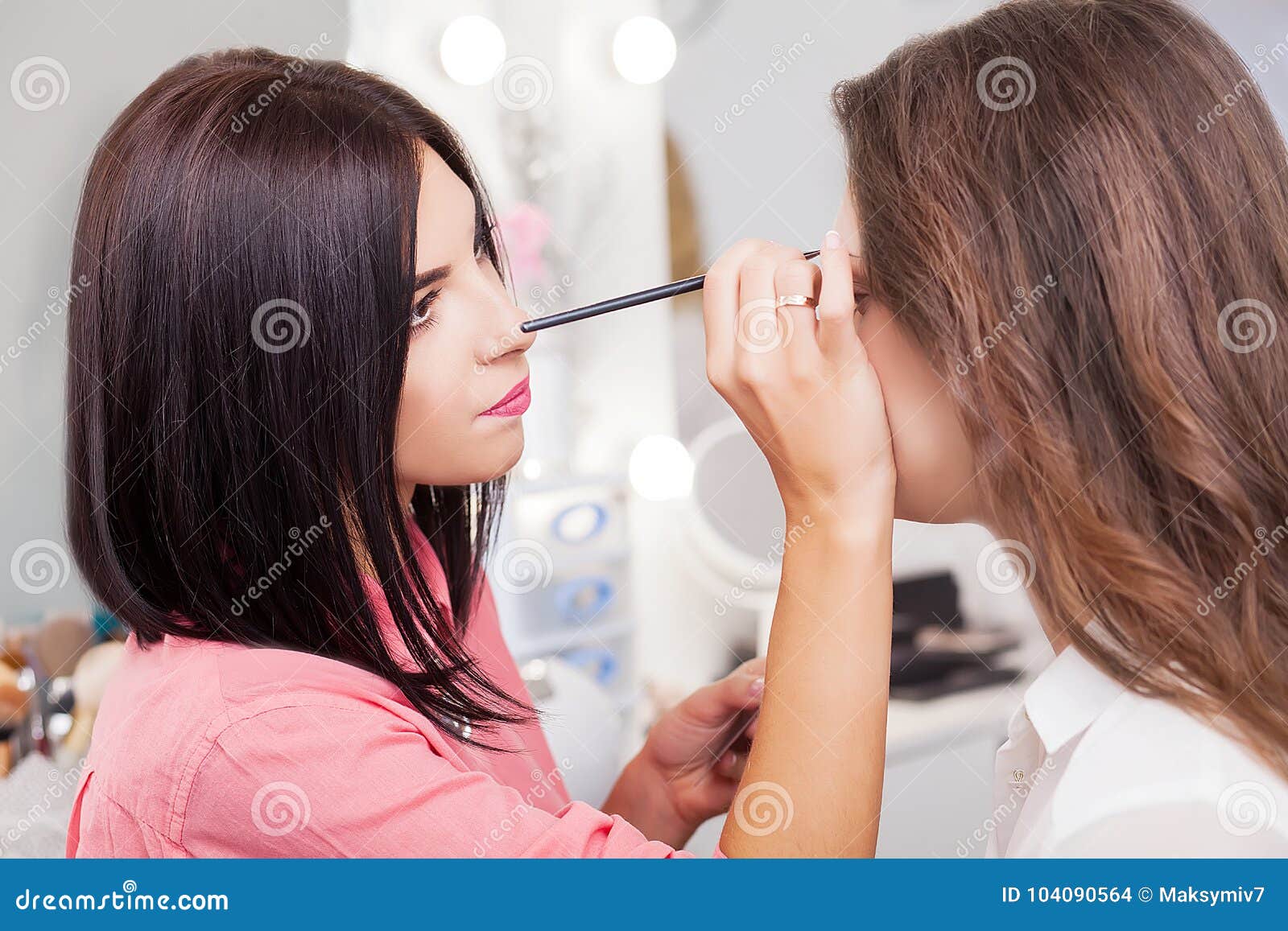 Professional Make-up Artist Doing Glamour Model Makeup at Work Stock ...