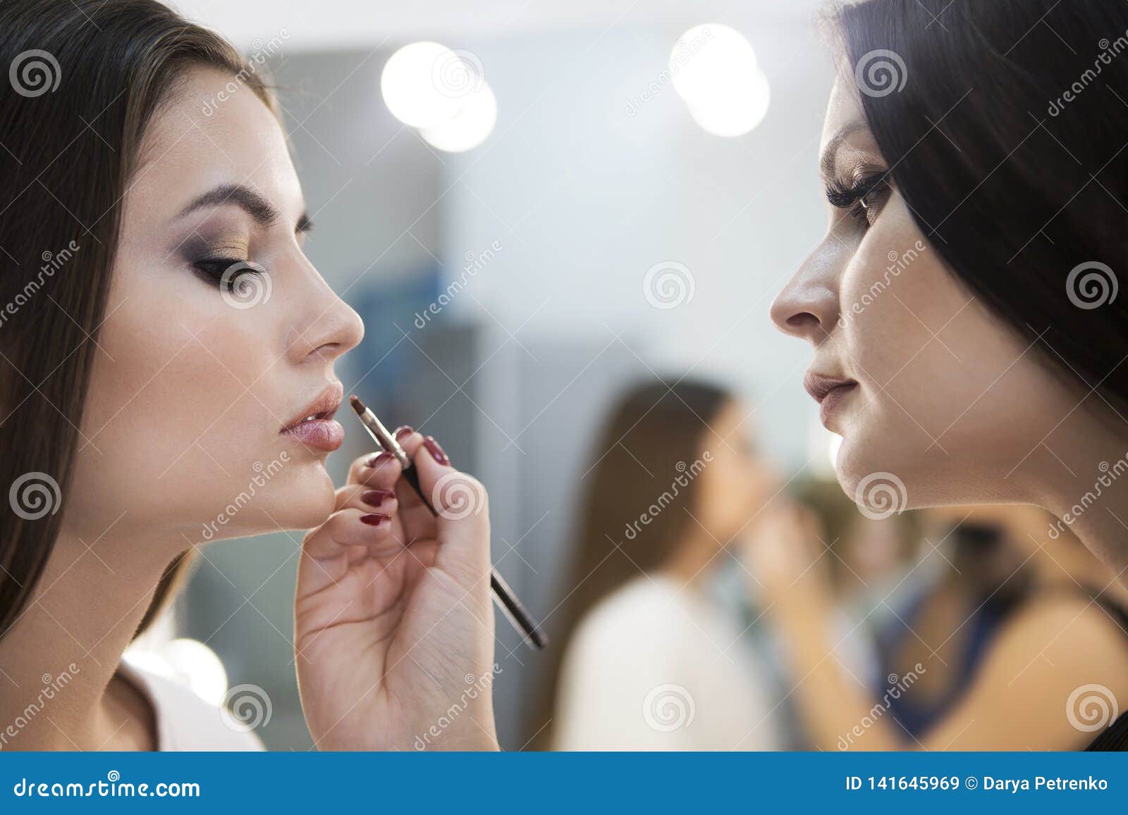 Professional Make Up Artist Doing Make Up In Beauty Salon Stock Image