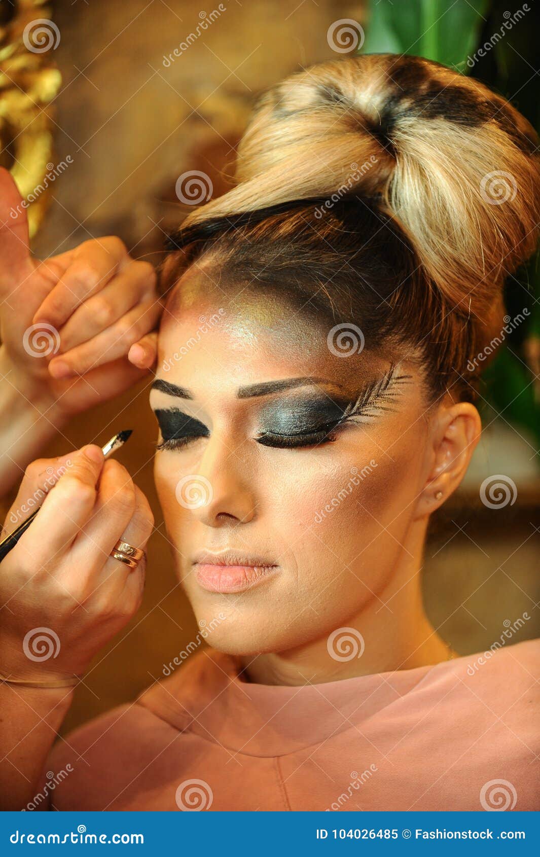 A Model Getting Ready with Creative Make Up before Photo Shoot. Stock ...