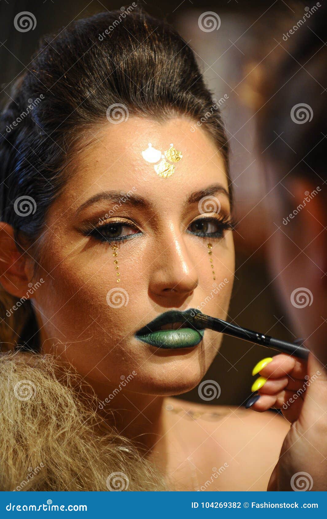 A Model Getting Ready with Creative Make Up before Photo Shoot. Stock ...