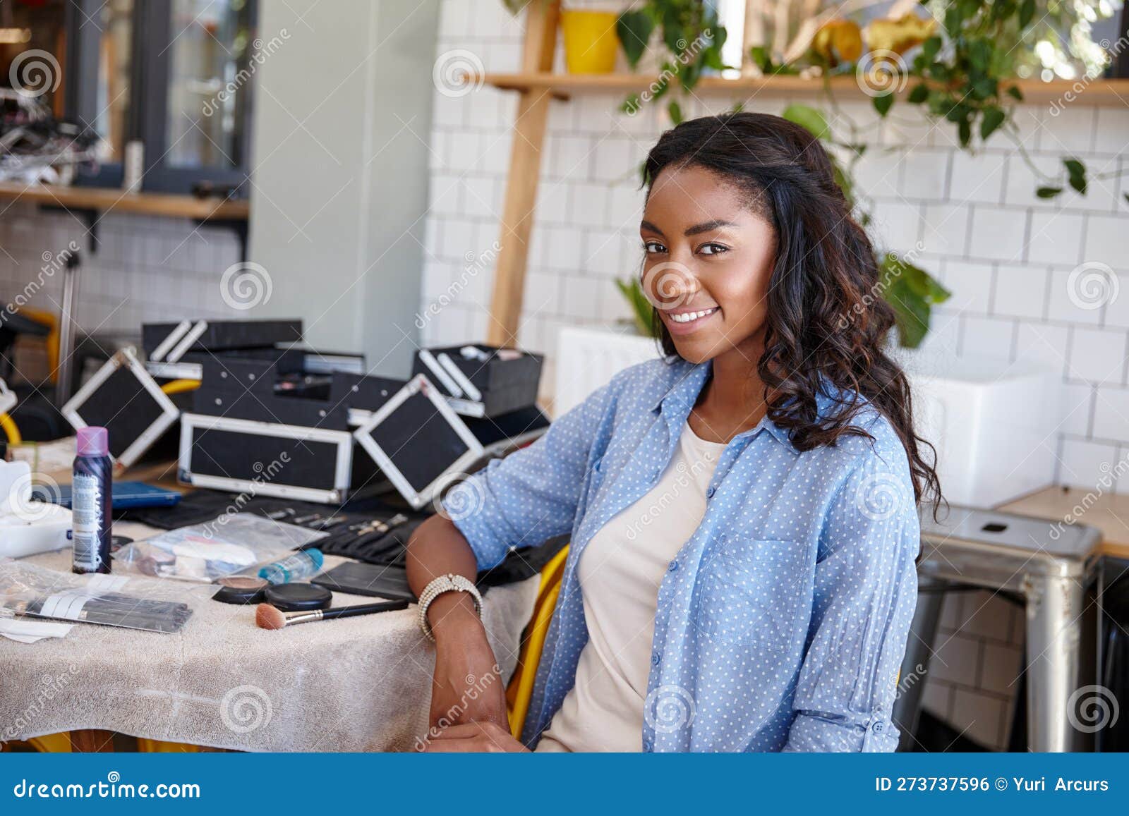 Professional Makeup Artist at Work. a Young Makeup Artist at Work ...