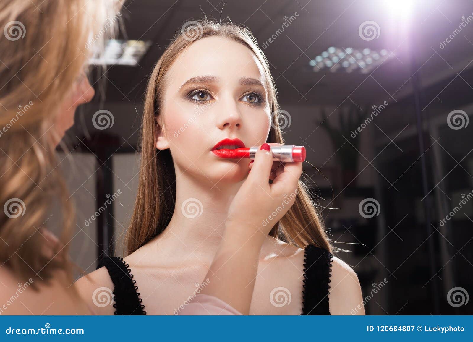 Makeup Woman Applying Red Lip Gloss On A Model Stock Image Image Of
