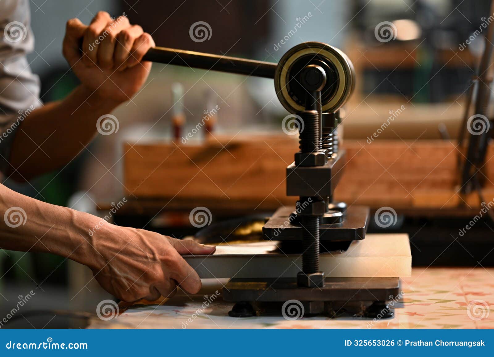 Professional Male Artisan in Apron Working with Iron Press Machine in ...