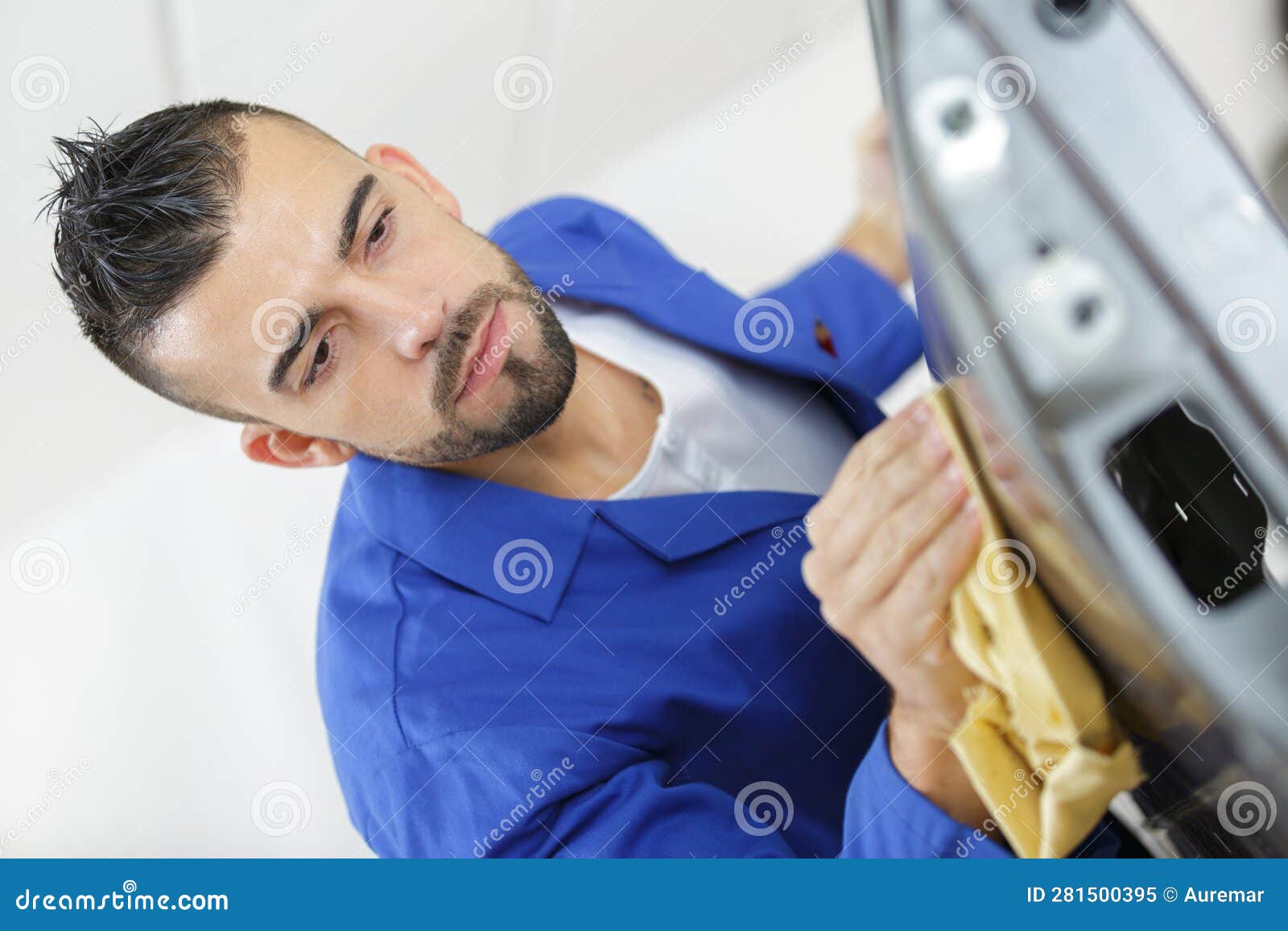 Professional Male Cleaner Using Soft Cloth Stock Image - Image of ...