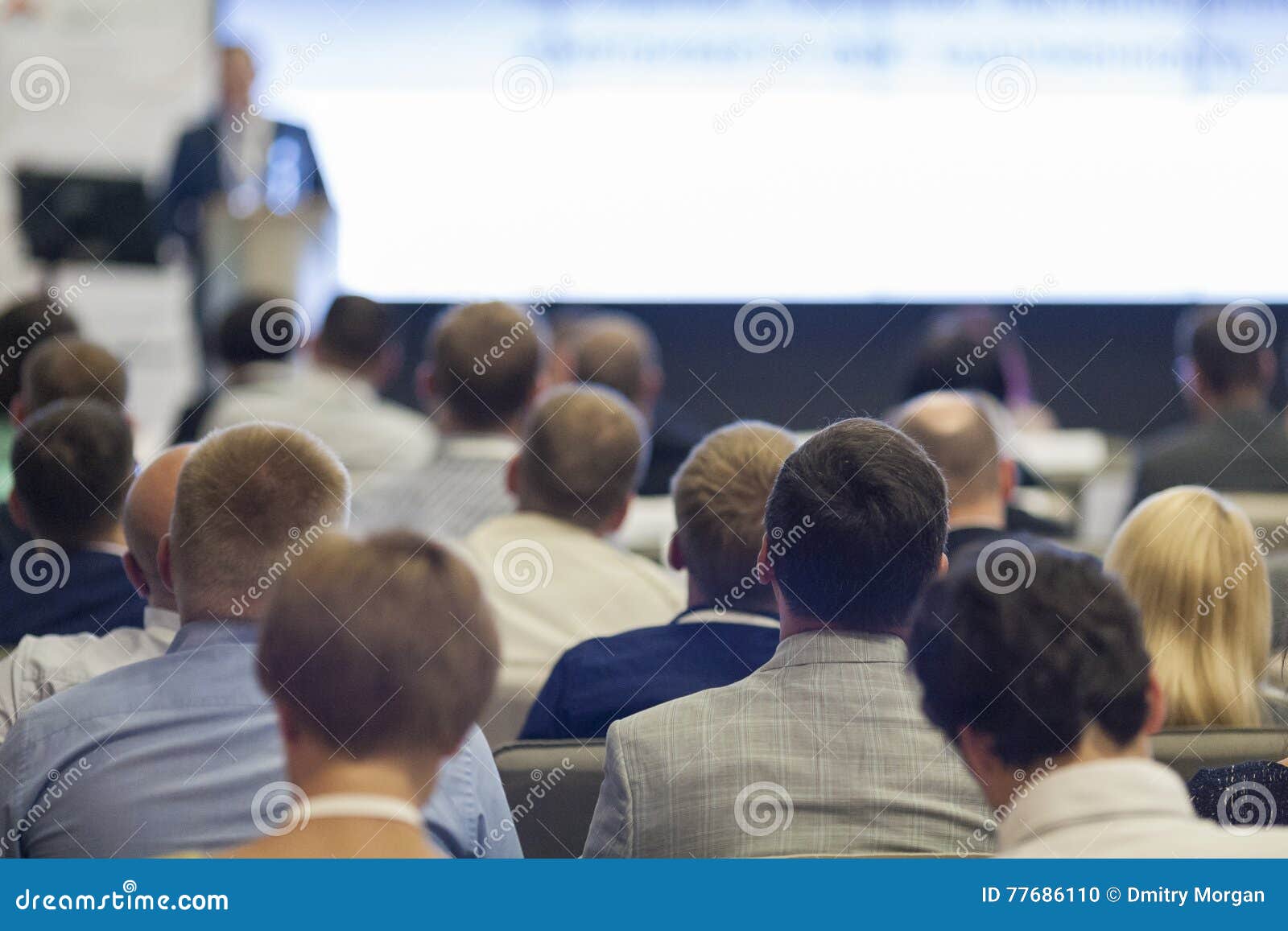 Professional Male Host Speaking in Front of the Audience during ...