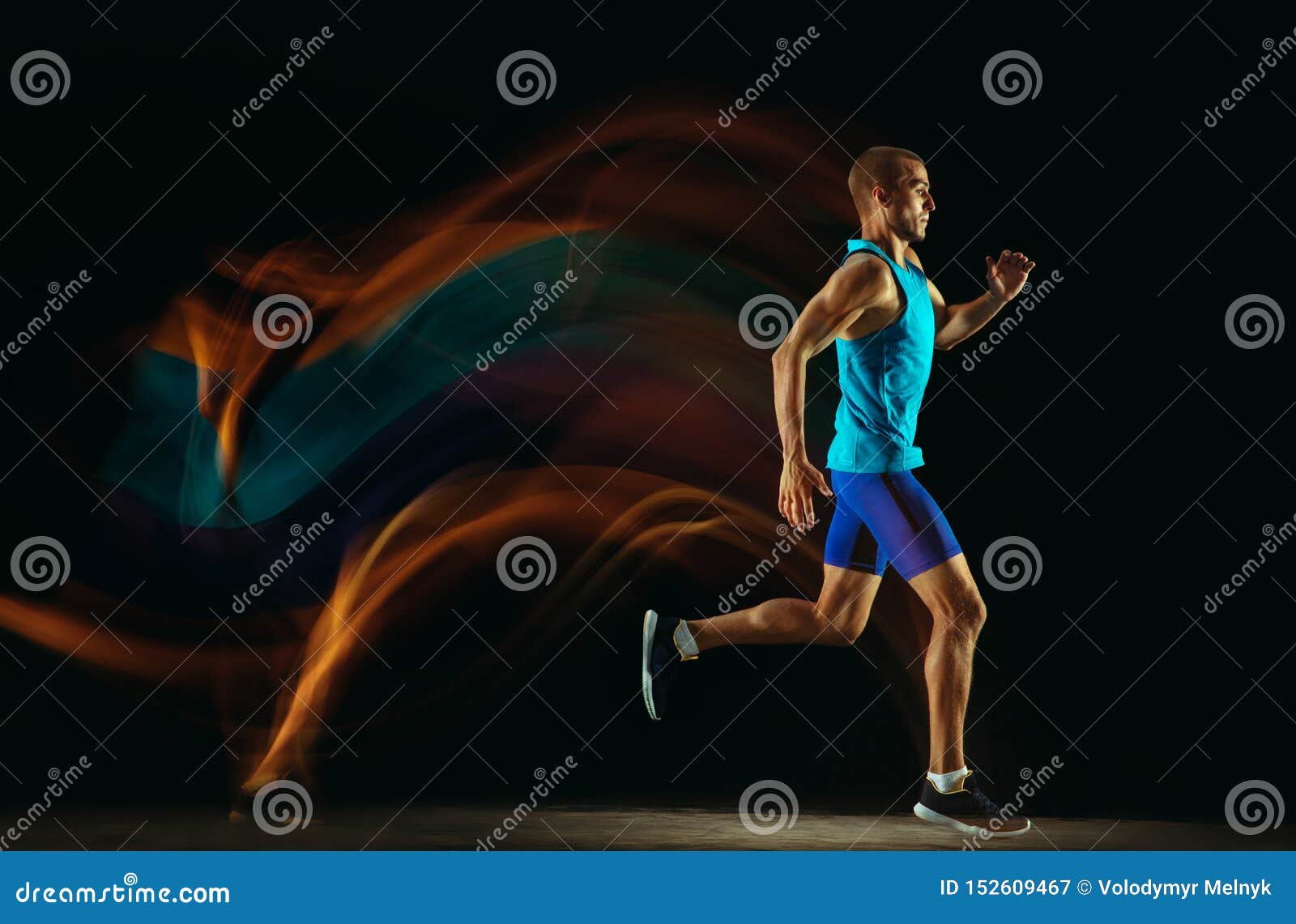 Professional Male Runner Training Isolated on Black Studio Background ...