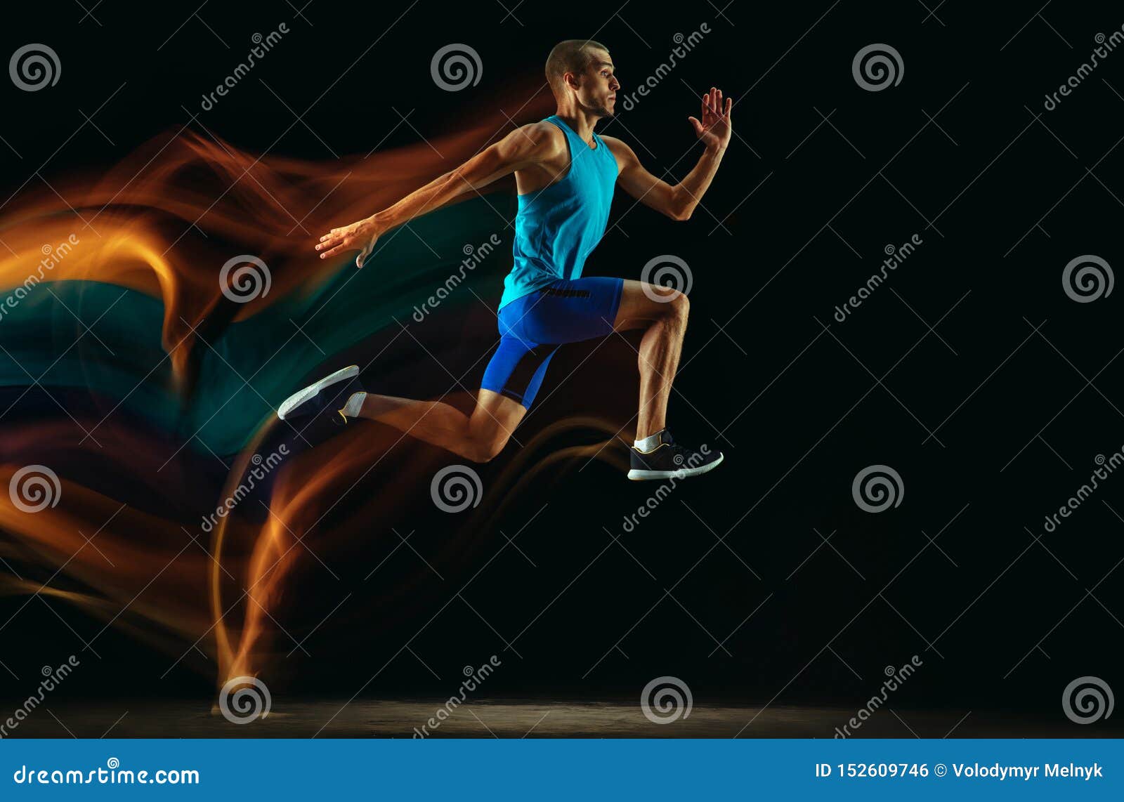 Professional Male Runner Training Isolated on Black Studio Background ...