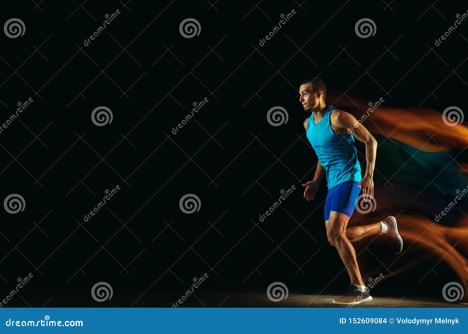 Professional Male Runner Training Isolated on Black Studio Background ...